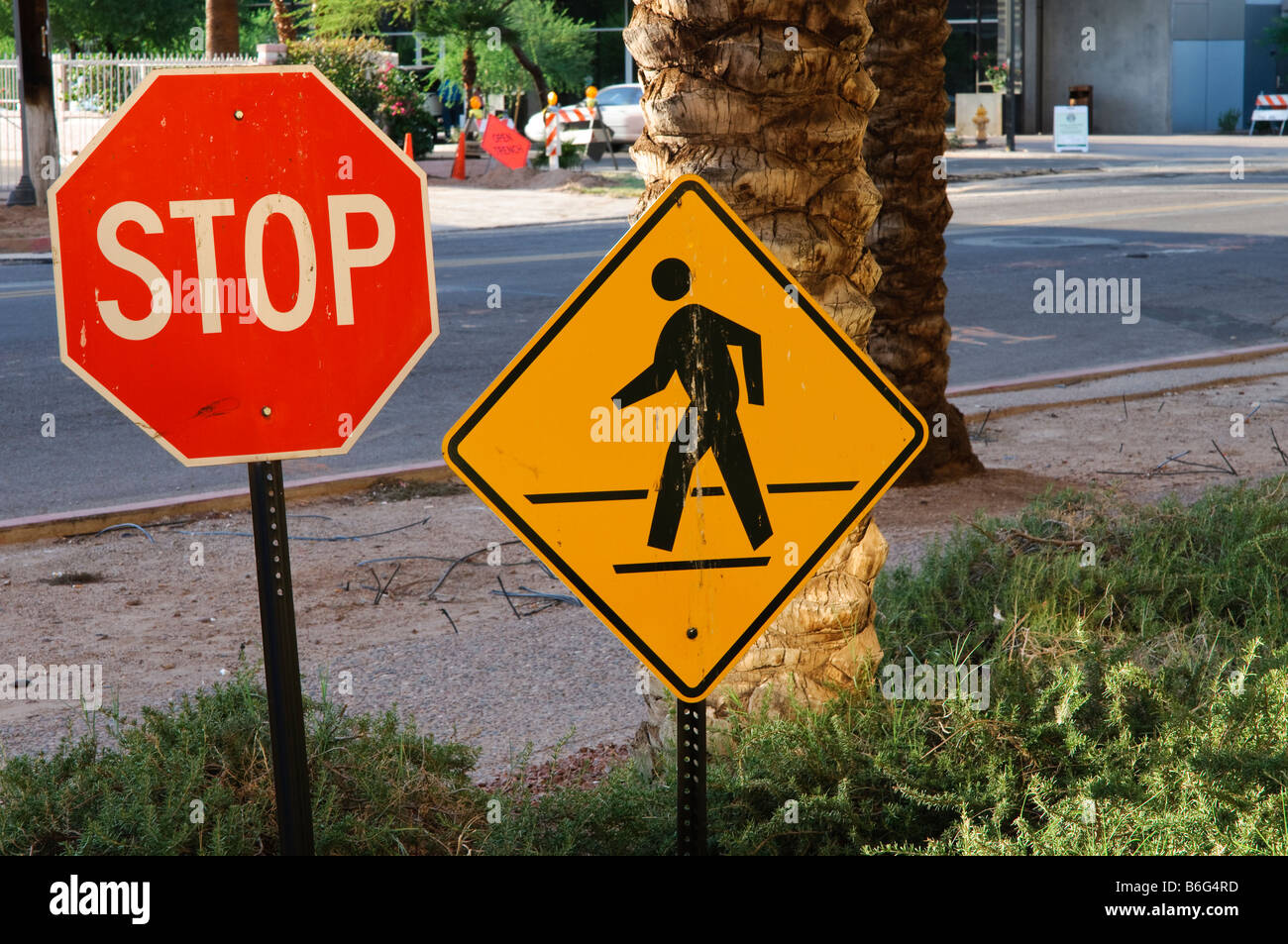 Stop sign and pedestrian crossing sign together Stock Photo - Alamy