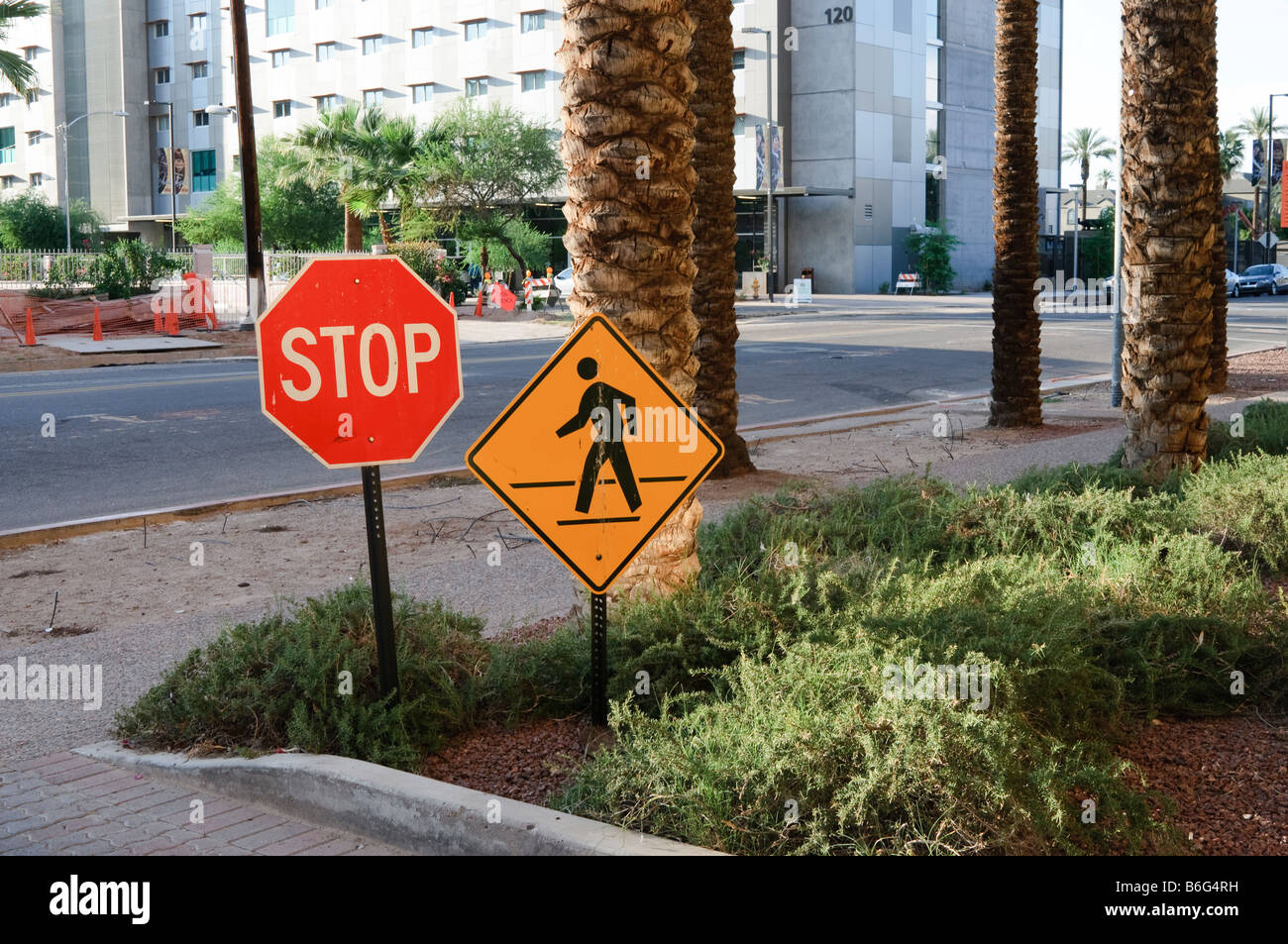 Stop sign and pedestrian crossing sign together Stock Photo - Alamy