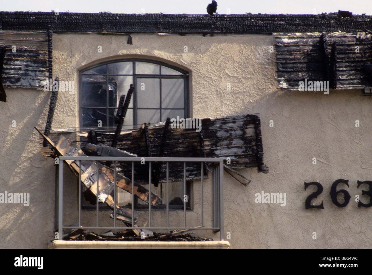 Window of burned-out apartment building Stock Photo - Alamy