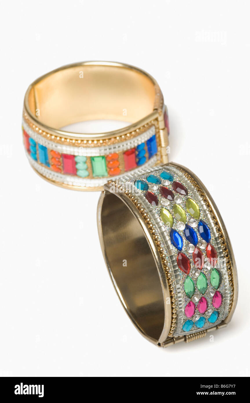 Gold bangles bracelets Cut Out Stock Images & Pictures - Alamy