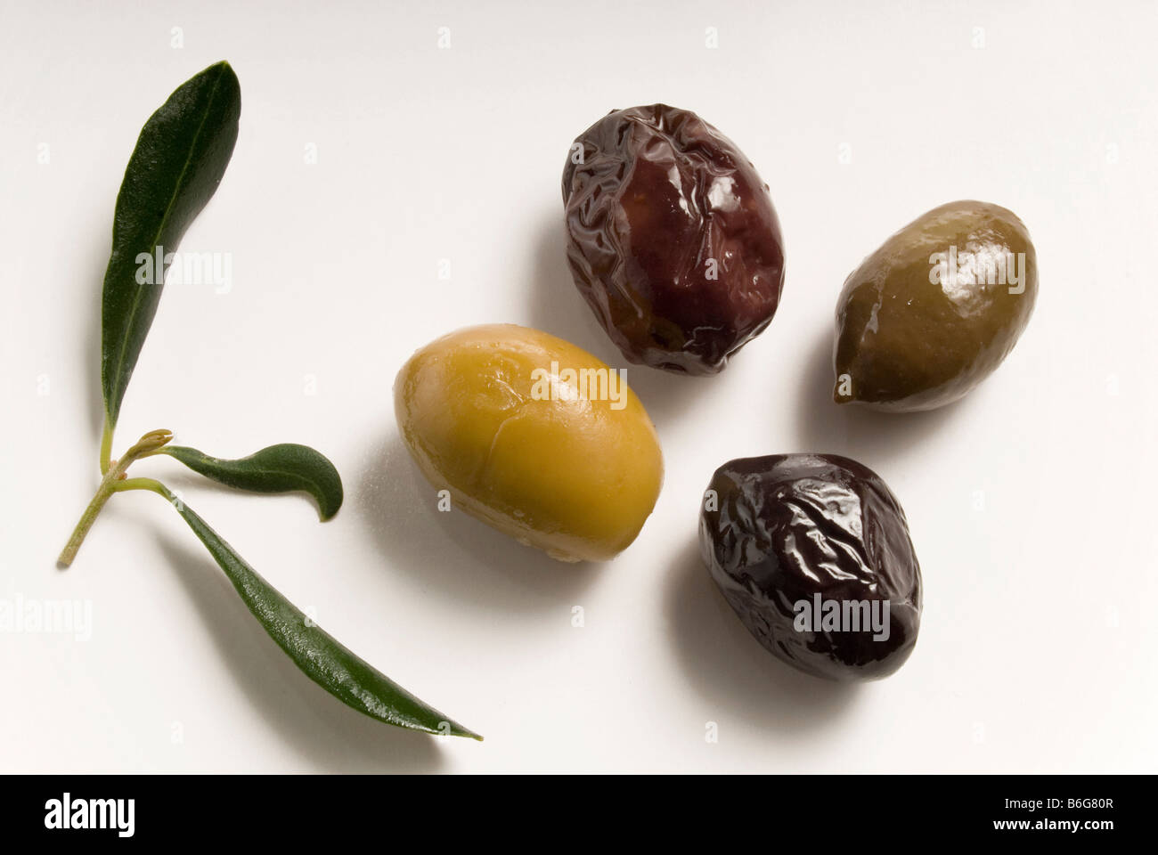 four different kind of olives Stock Photo - Alamy