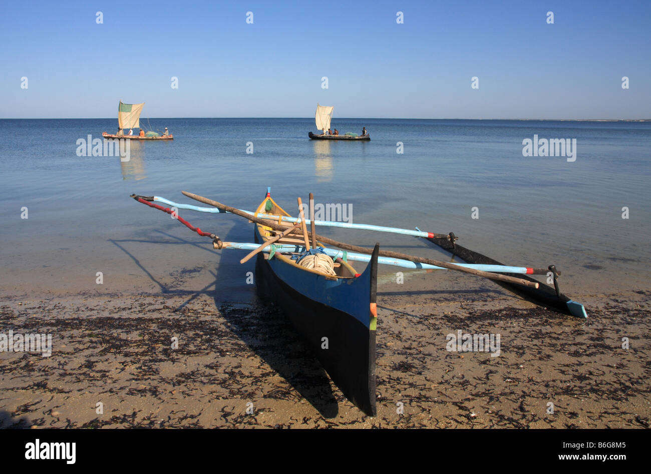Malagasy fishermen and their outrigger canoes pirogue some of which had ...