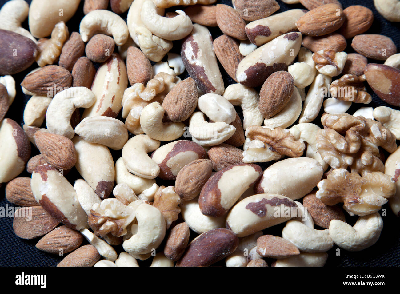 A selection of mixed nuts Stock Photo - Alamy