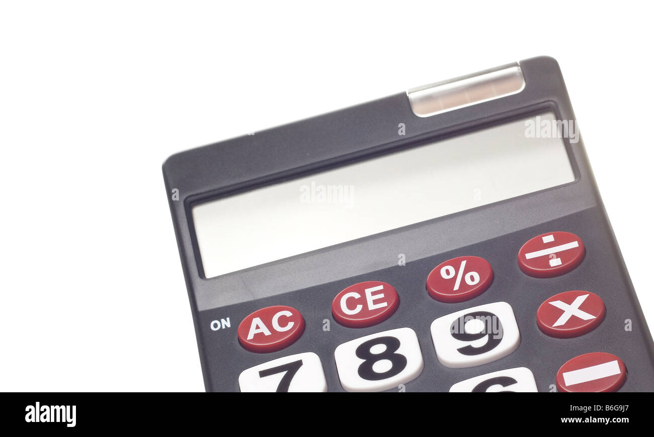 a dark calculator machine with big numbers and buttons Stock Photo - Alamy