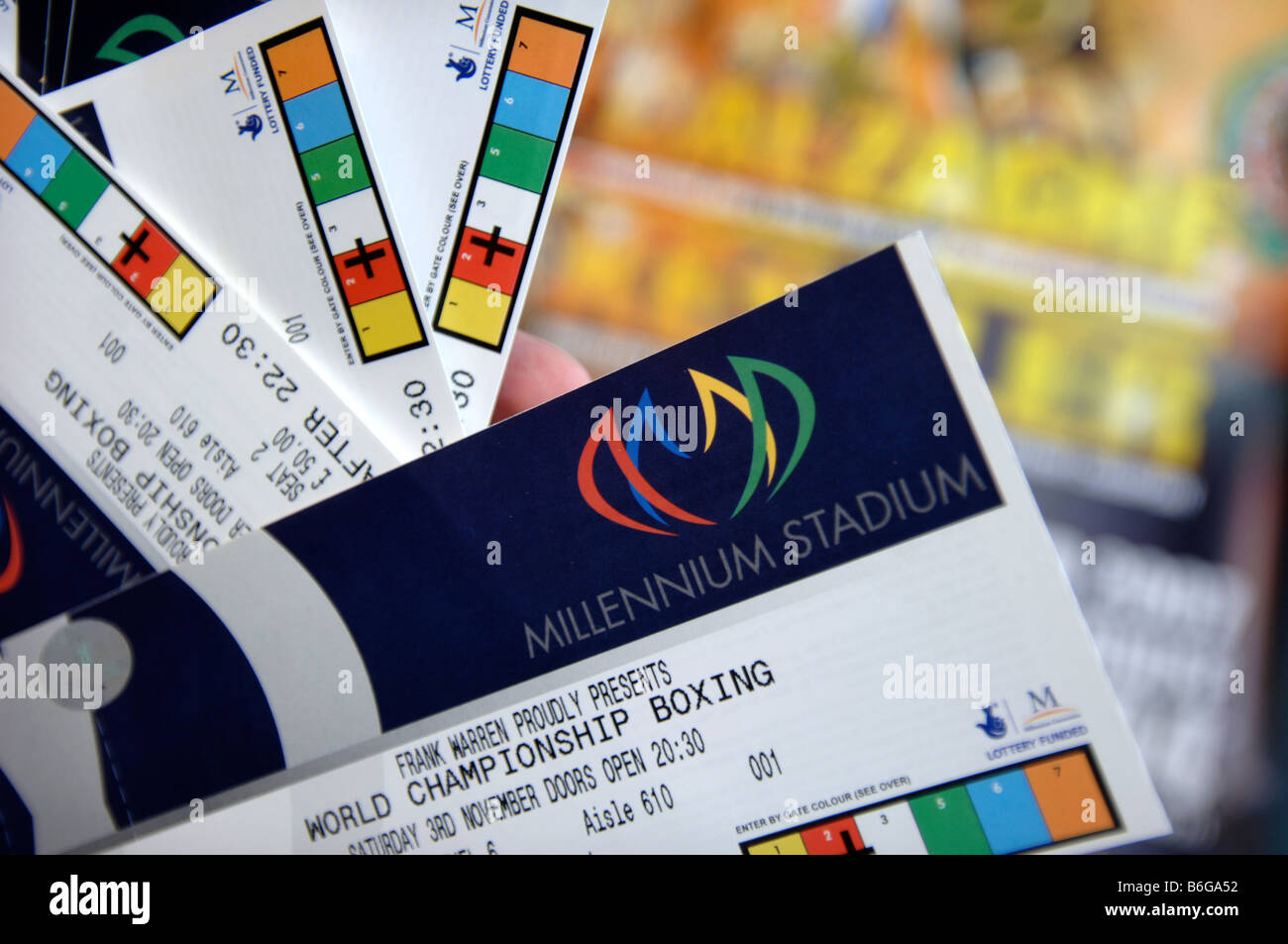 A BOXING FAN HOLDS TICKETS FOR THE FIGHT BETWEEN JOE CALZAGHE AND MIKEL ...
