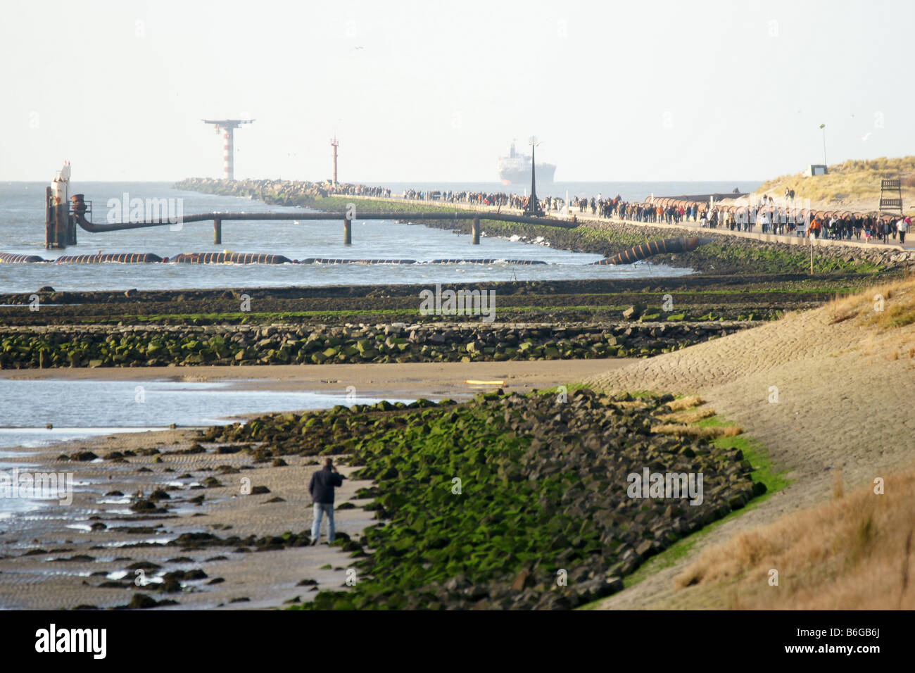 Dyke levee sand rock beach at Hoek van Holland sea entrance to ...