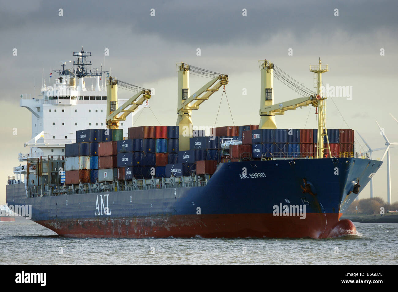 Huge whole hull big ship cargo container vessel departing Europoort ...