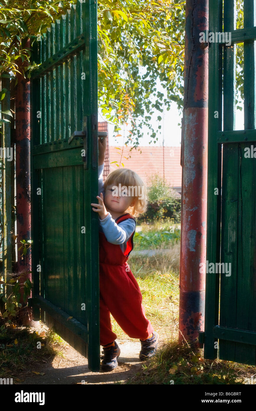 Child reaching door handle hi-res stock photography and images - Alamy