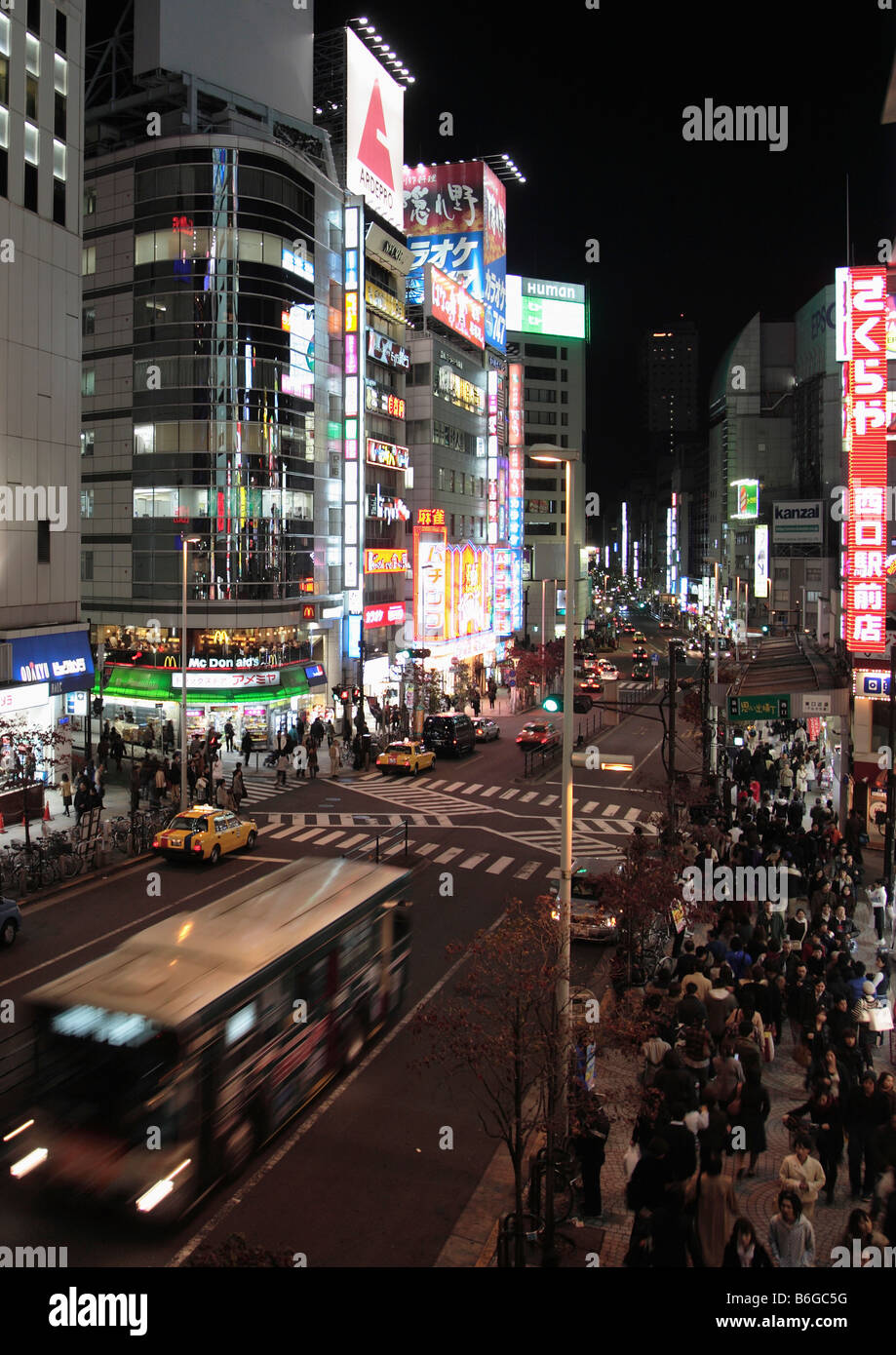 Japan Tokyo Shinjuku night street scene nightlife people Stock Photo ...