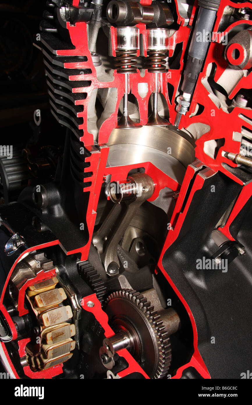 Cut away view of interior of modern motor cycle engine showing piston ...
