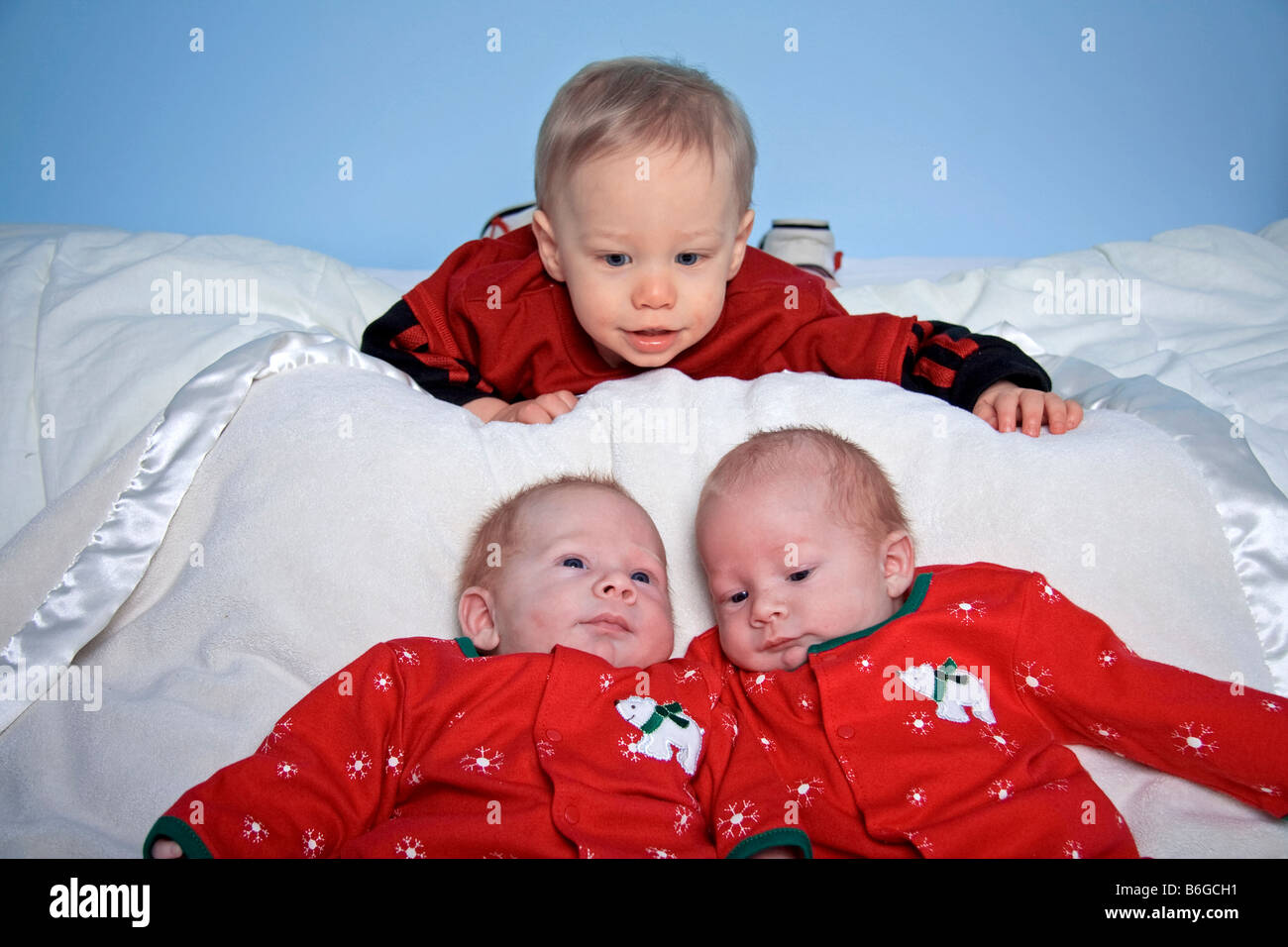 Twins with older brother hi-res stock photography and images - Alamy