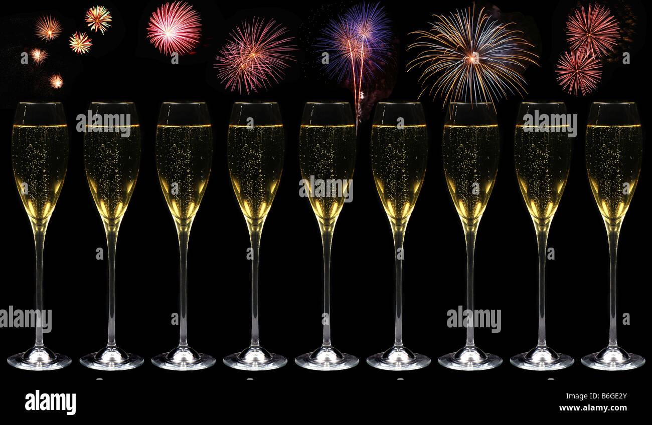 Glasses of champagne and fireworks Stock Photo - Alamy