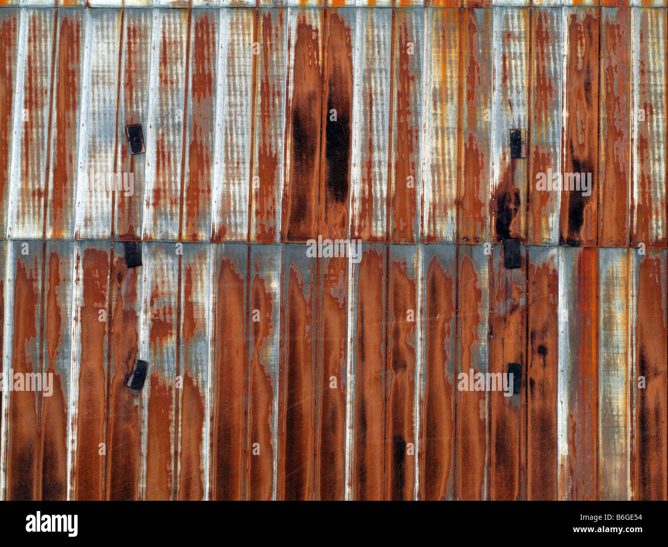 Rusty metal wall of equipment shed Stock Photo - Alamy