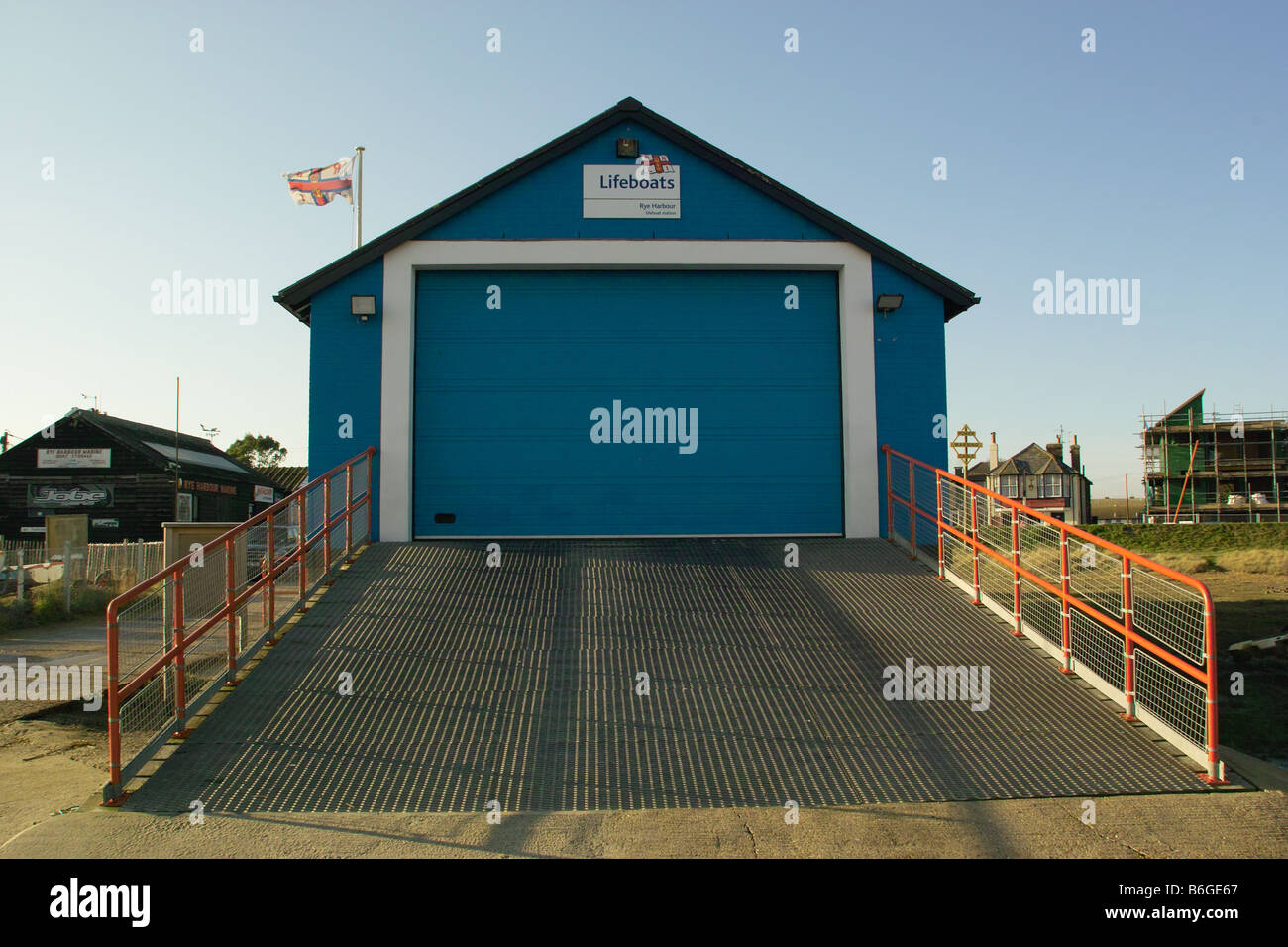 blue door slipway red handrail rnli boathouse rye east sussex uk Stock ...