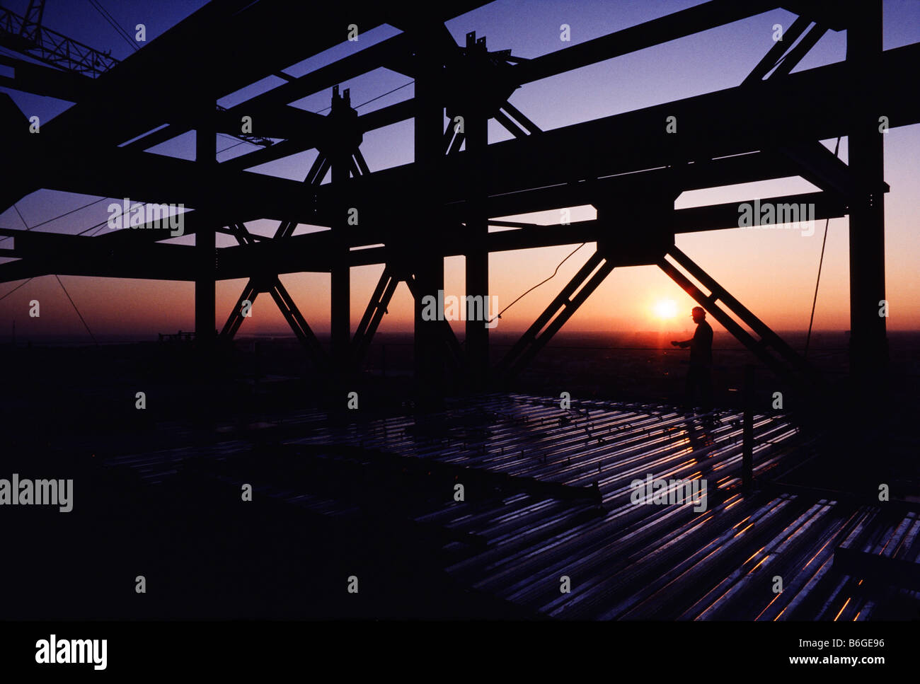 High Rise Building under construction, steel workers, walking on steel ...