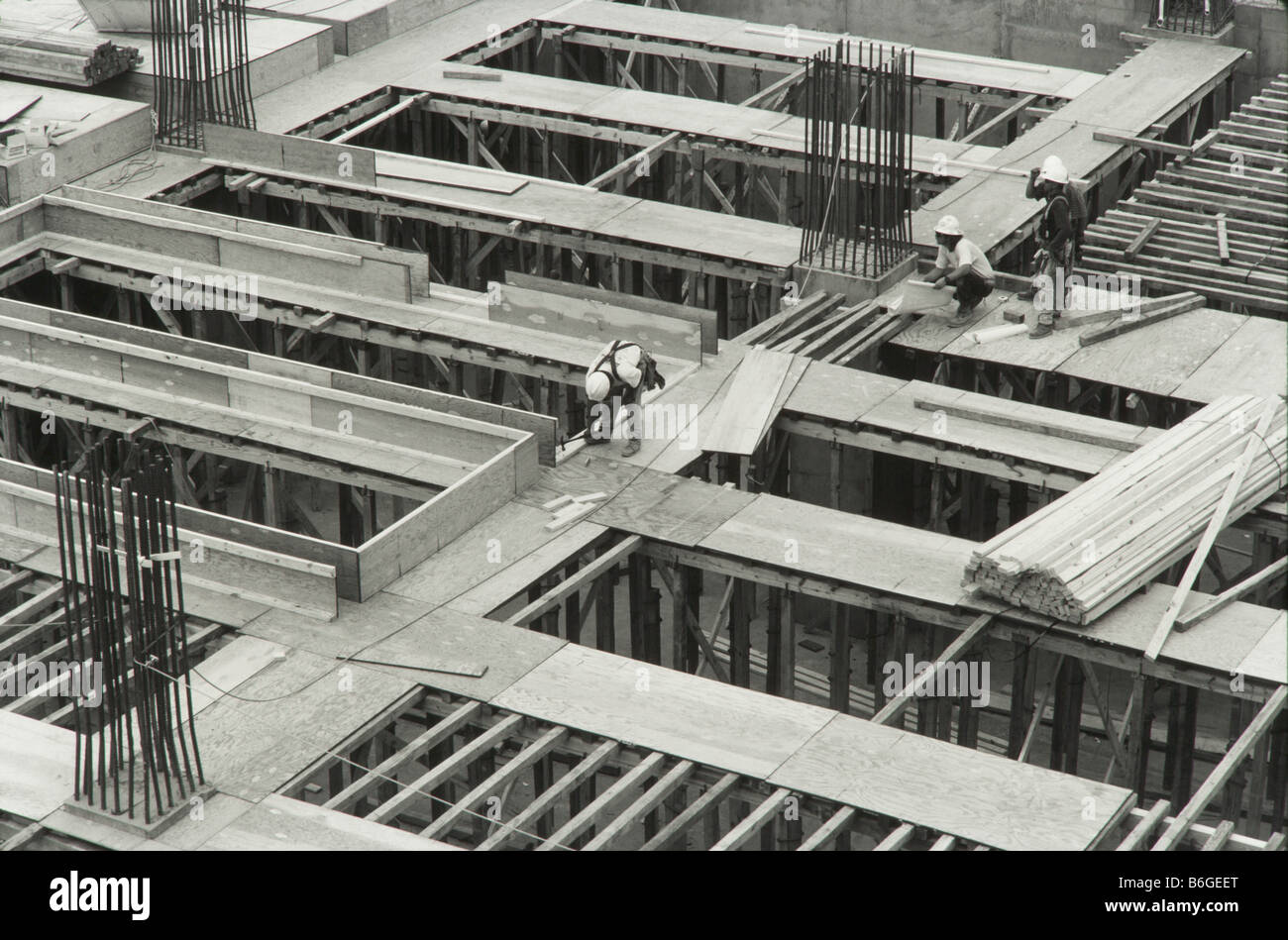 High Rise Building under construction, workers, pouring concrete ...