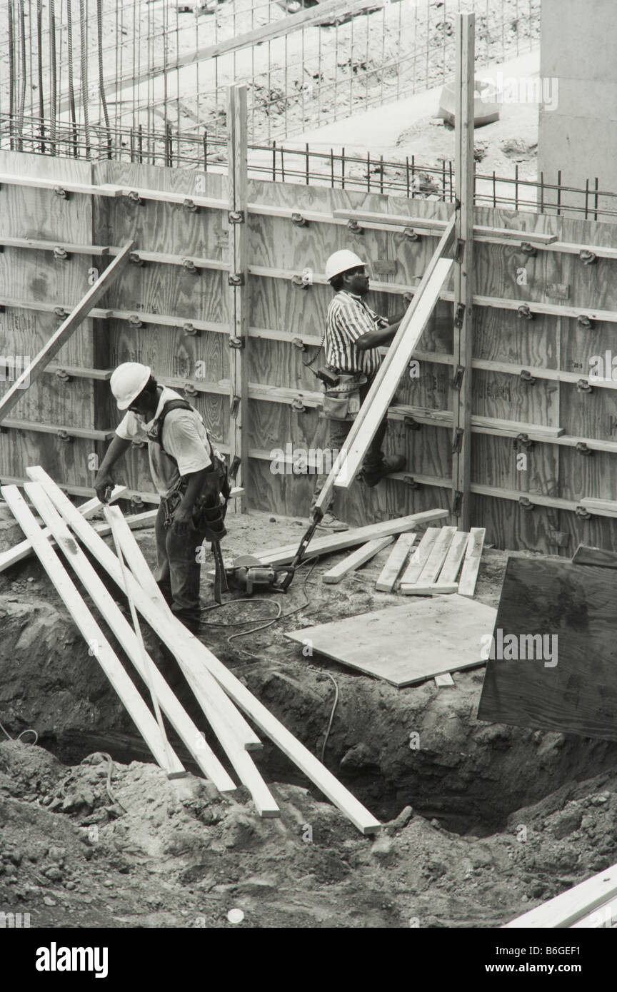 High Rise Building under construction, workers, pouring concrete ...