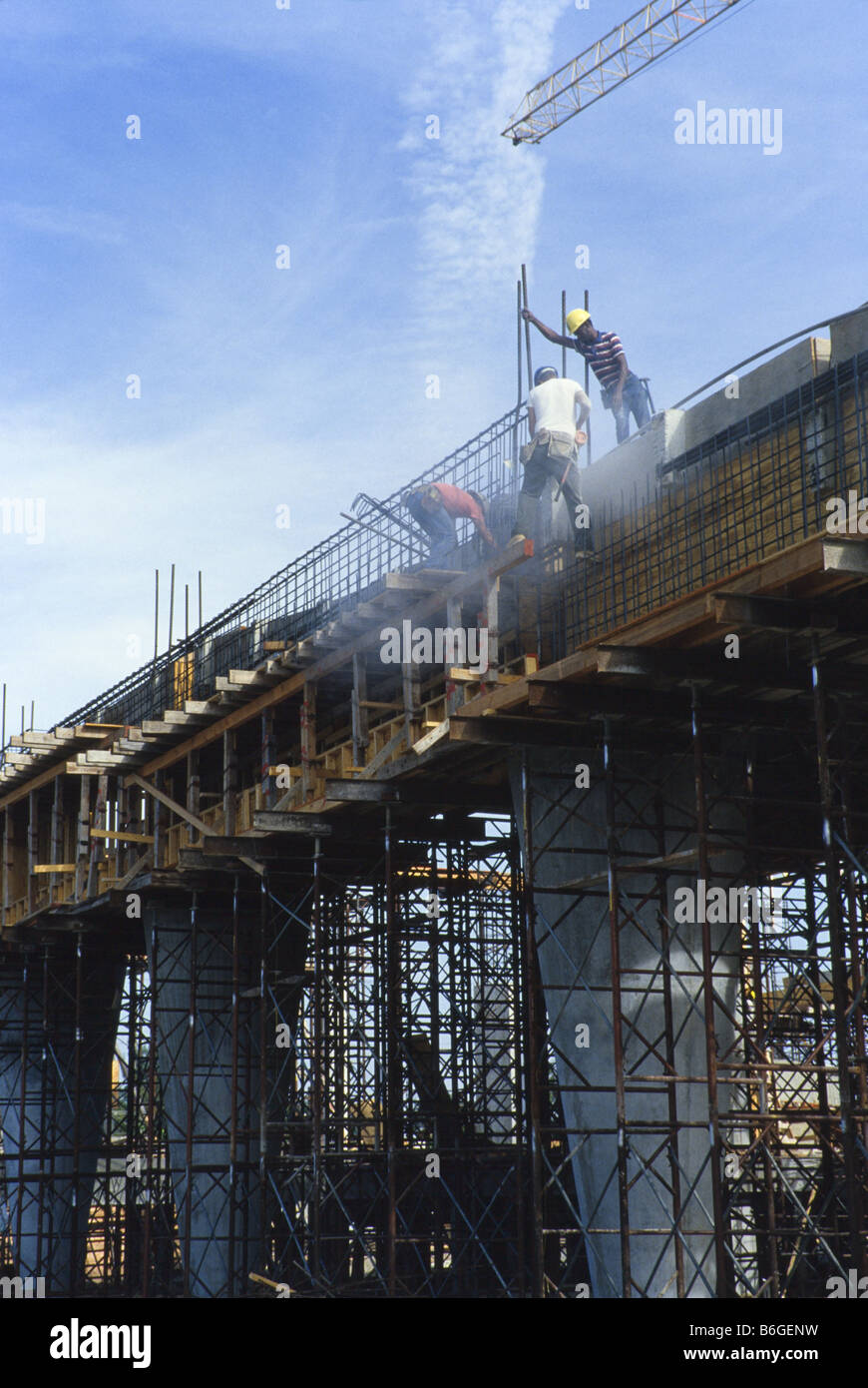 High Rise Building under construction, workers, pouring concrete ...