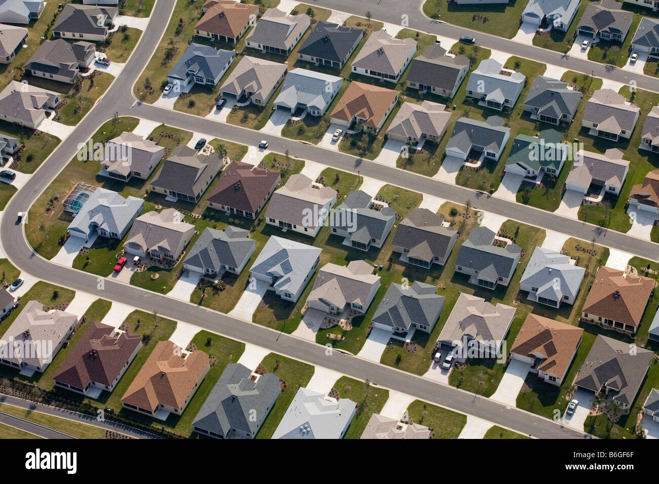 Suburban homes are clustered together in a housing development near ...