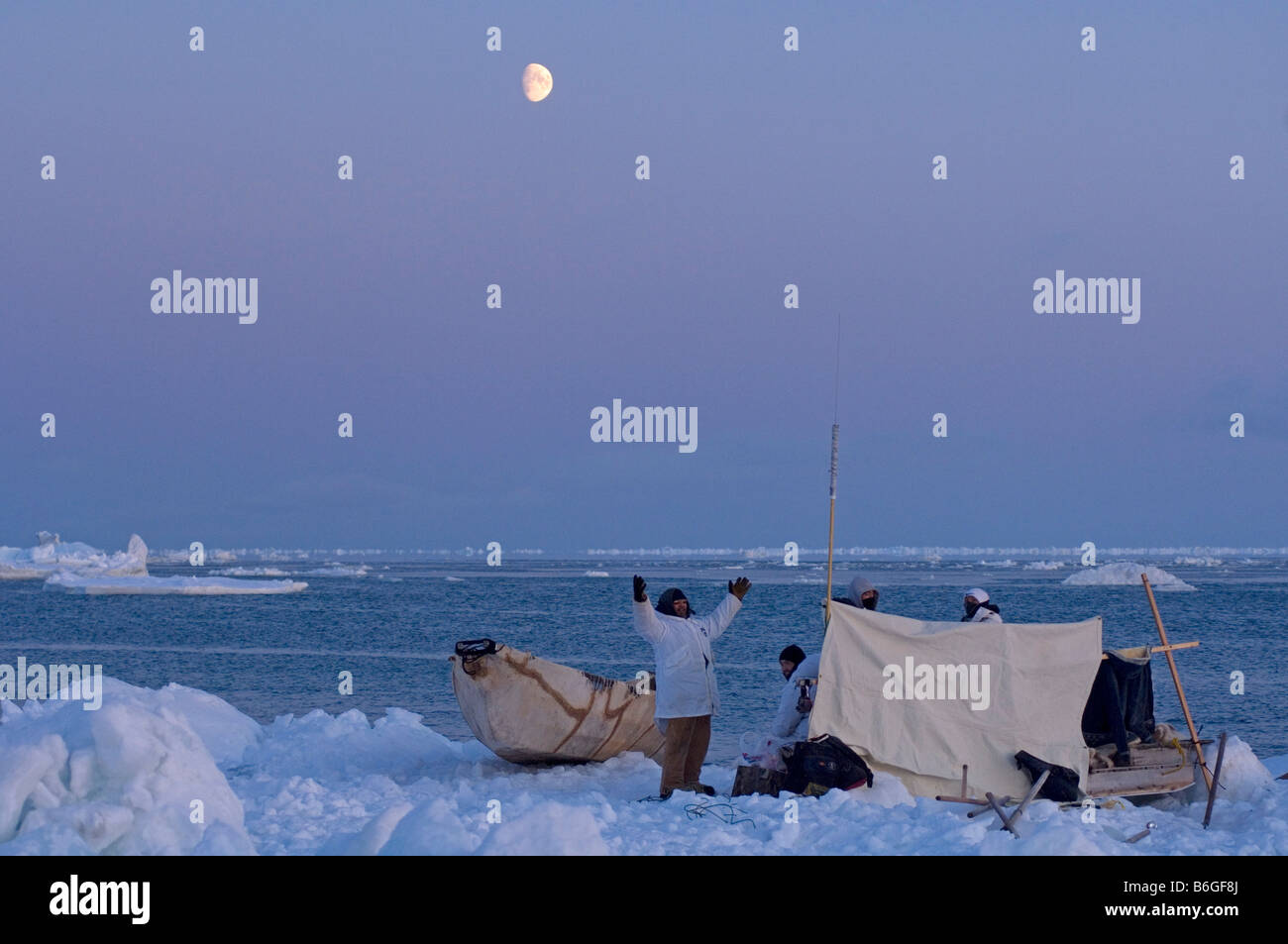 Inupiaq whaling captain and his crew wait for passing bowhead whales at ...