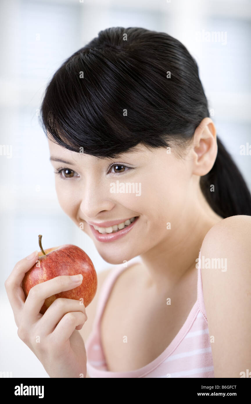 Woman face thinking apple hi-res stock photography and images - Alamy