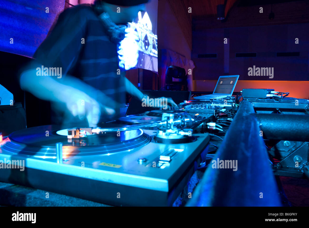DJ scratching a mix Stock Photo - Alamy