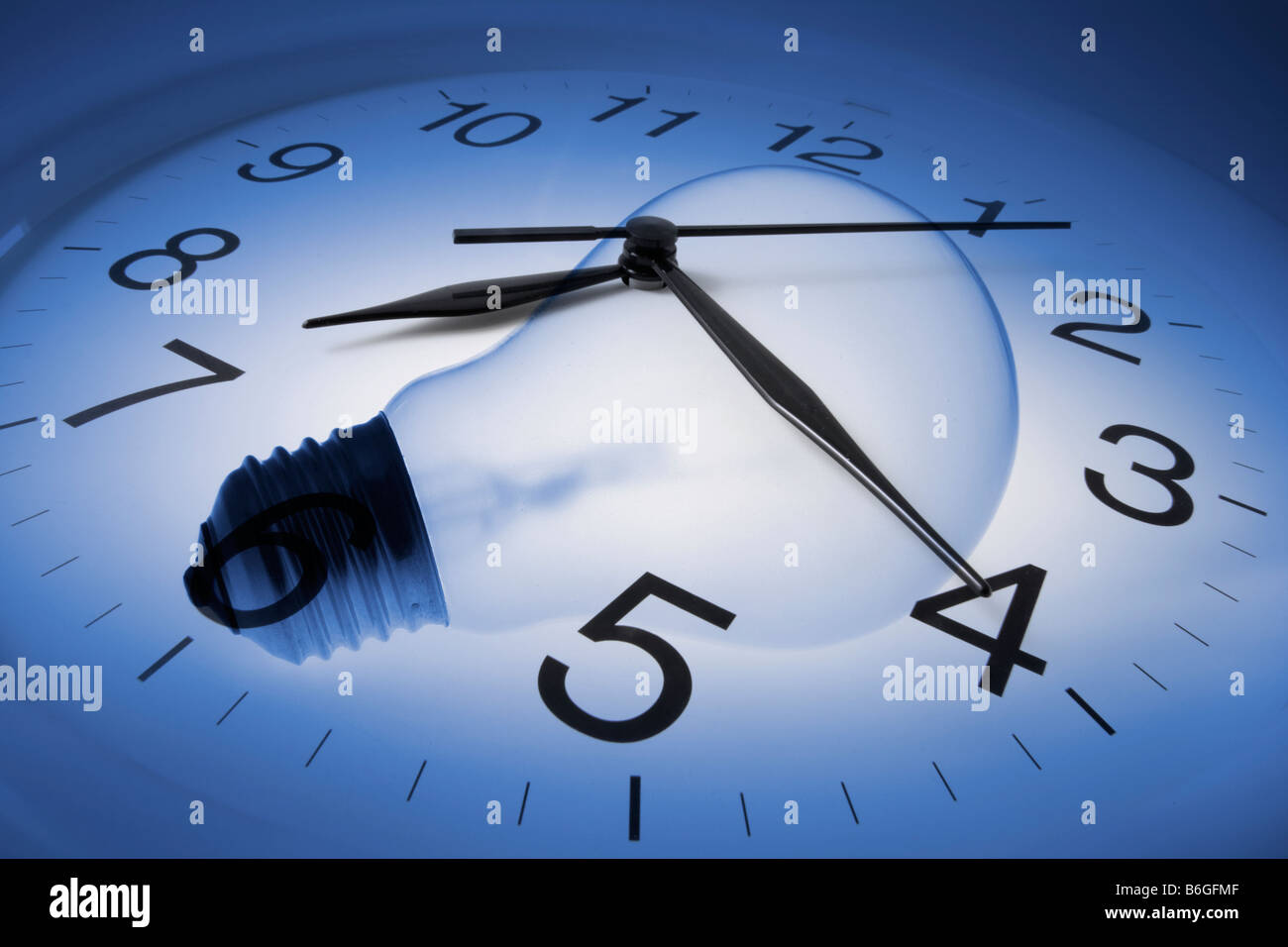 Clock and Light Bulb Stock Photo - Alamy