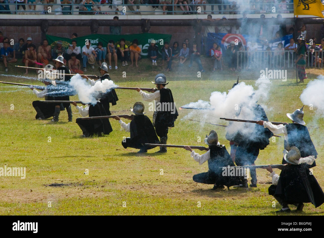 marksmen firing during mock battle at the Surin Elephant Festival in ...