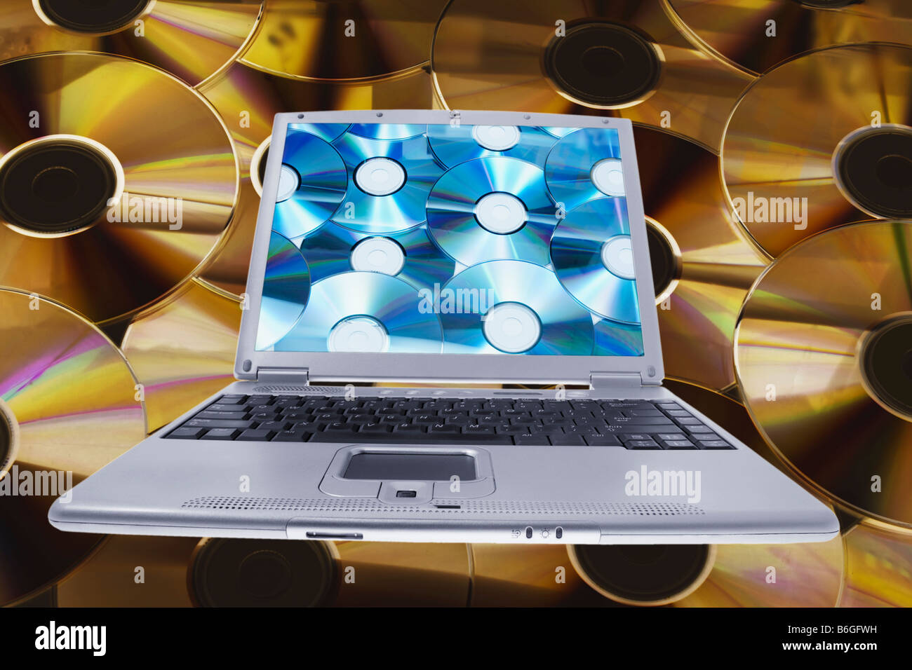 Laptop and Compact Discs Stock Photo - Alamy