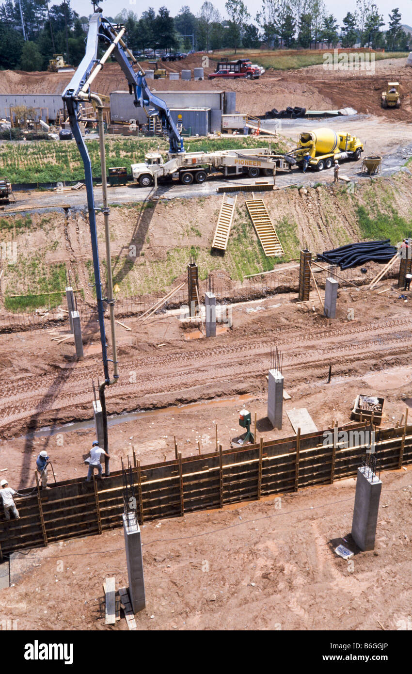 High Rise Building under construction, workers, pouring concrete ...