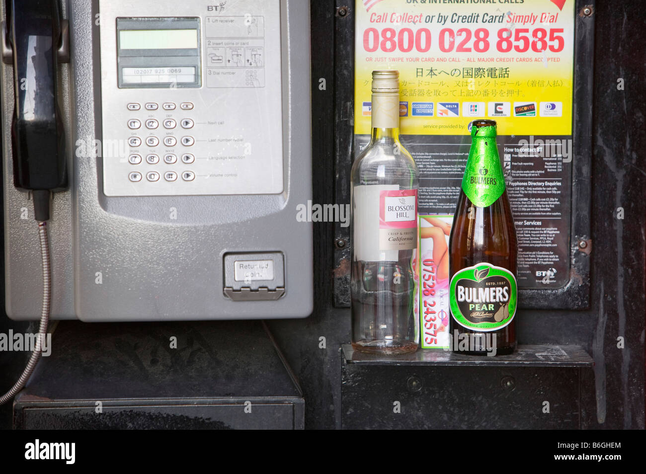 Booze bottles abandoned in a telephone box in London UK Stock Photo - Alamy