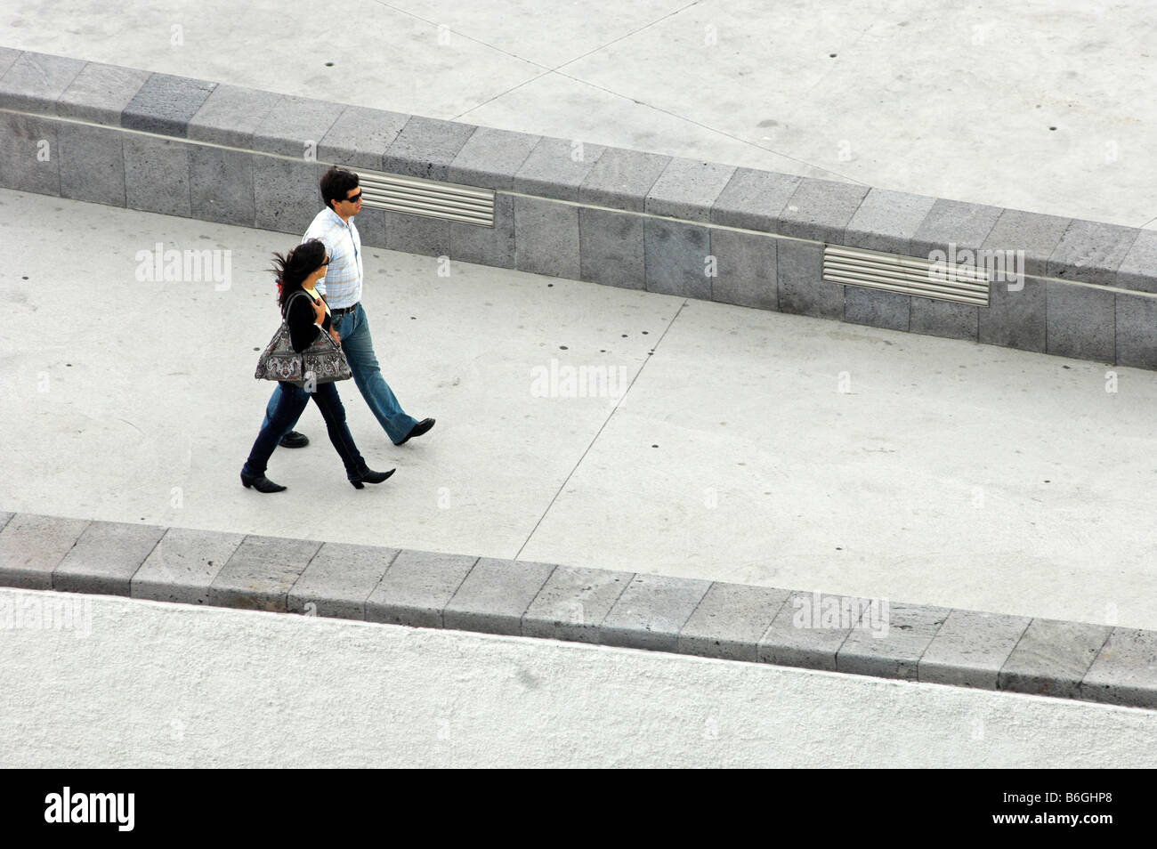 Pedestrians walking on pavement hi-res stock photography and images - Alamy