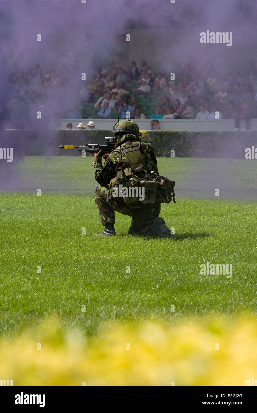 A soldier taking part in a display of mock warfare in one of the arenas ...