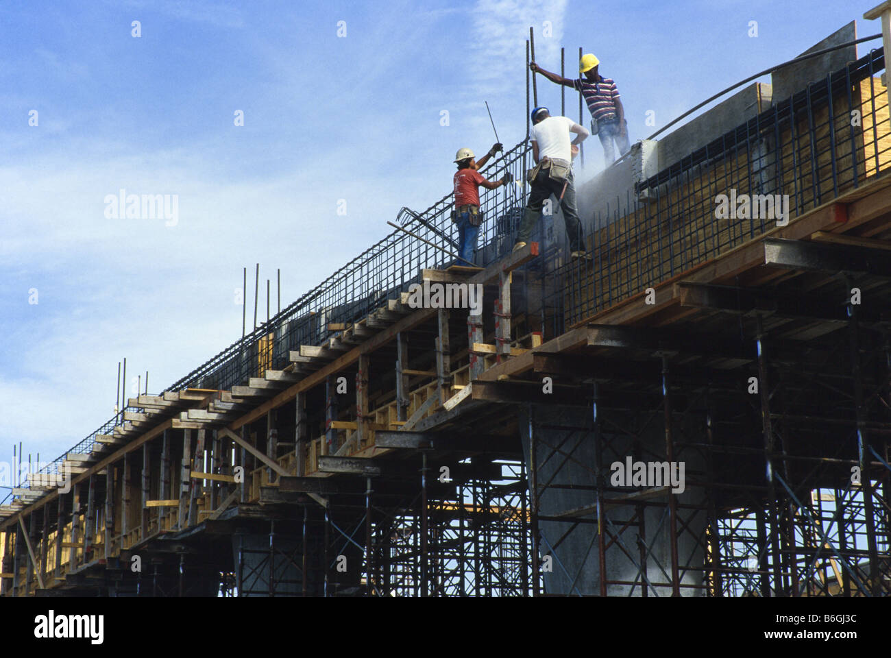 High Rise Building under construction, workers, pouring concrete ...