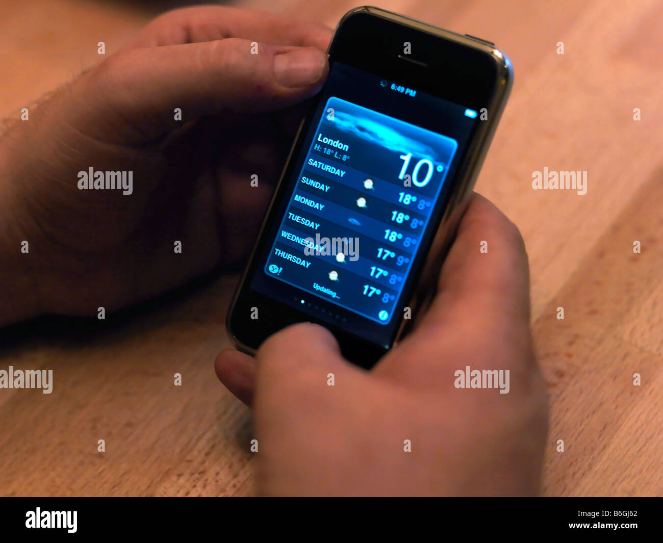 Weather forecast on mobile phone hi-res stock photography and images ...