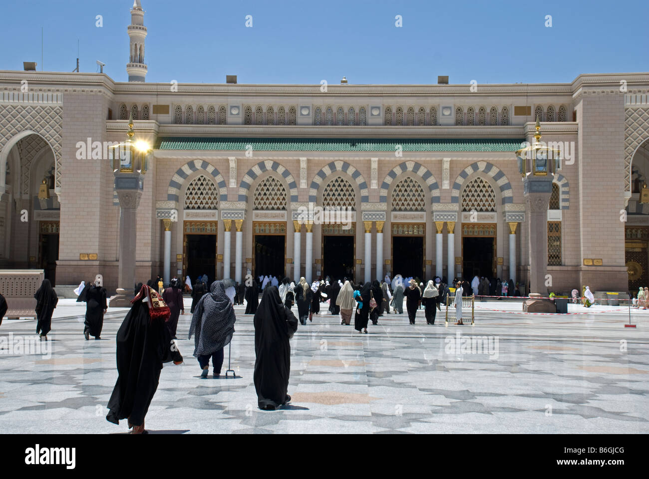 Woman walking towards the Affan gate for Dhur prayer The Mosque of the ...
