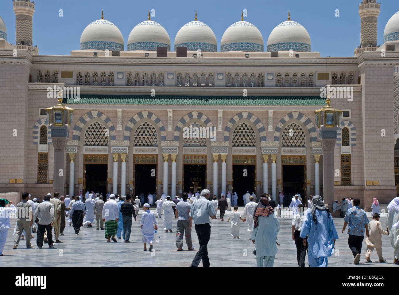 People walking towards the King Fahd gate for Dhur prayer The Mosque of ...
