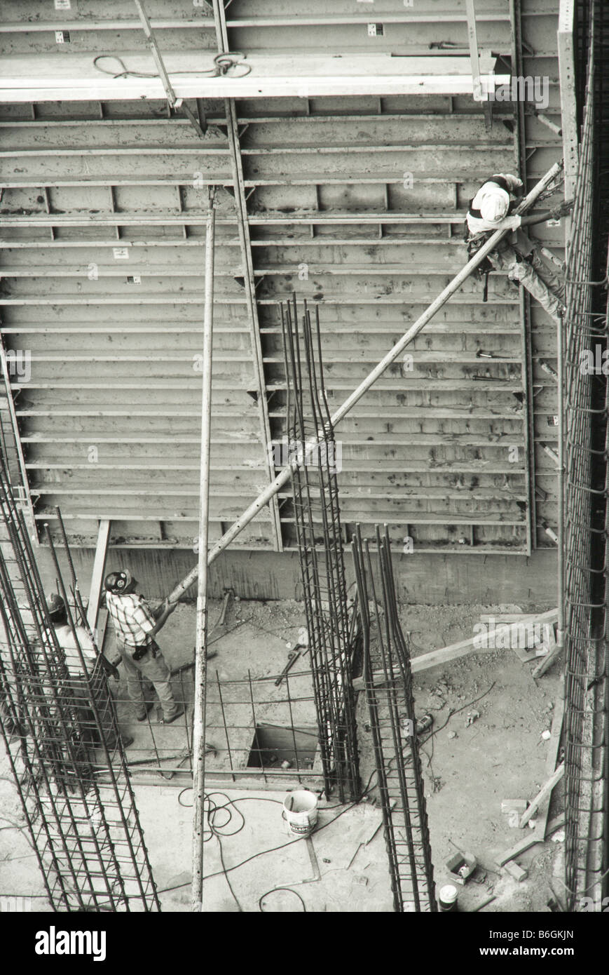High Rise Building under construction, workers, pouring concrete ...