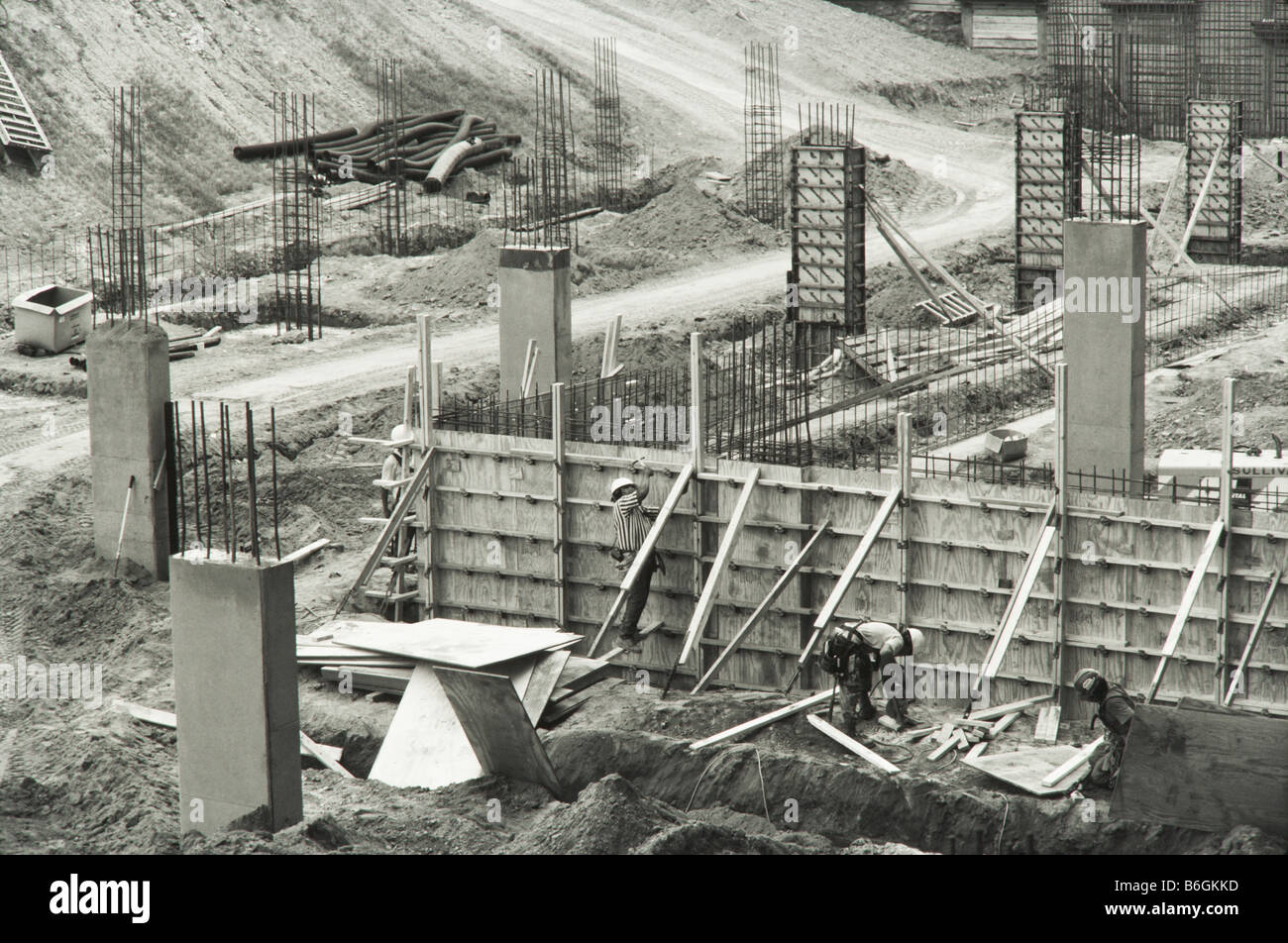 High Rise Building under construction, workers, pouring concrete ...