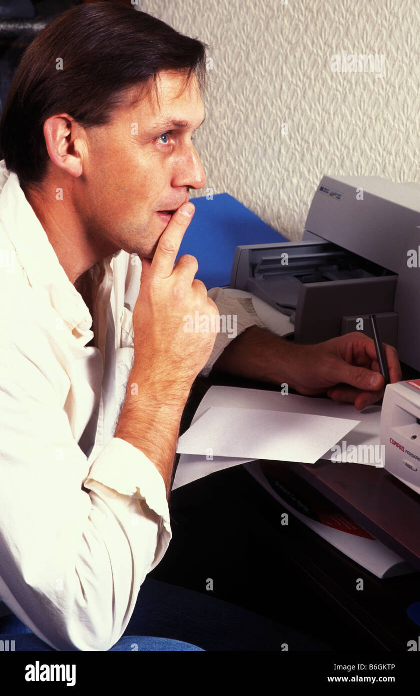 Contemplative man writing letter hi-res stock photography and images ...