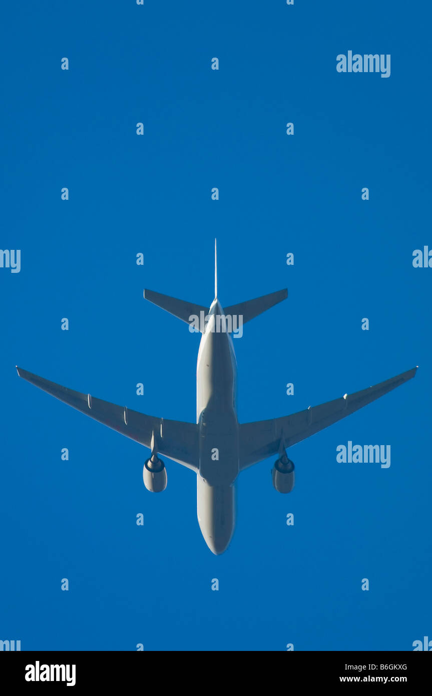Close up of the underside of a jet passenger aircraft as it prepares to ...