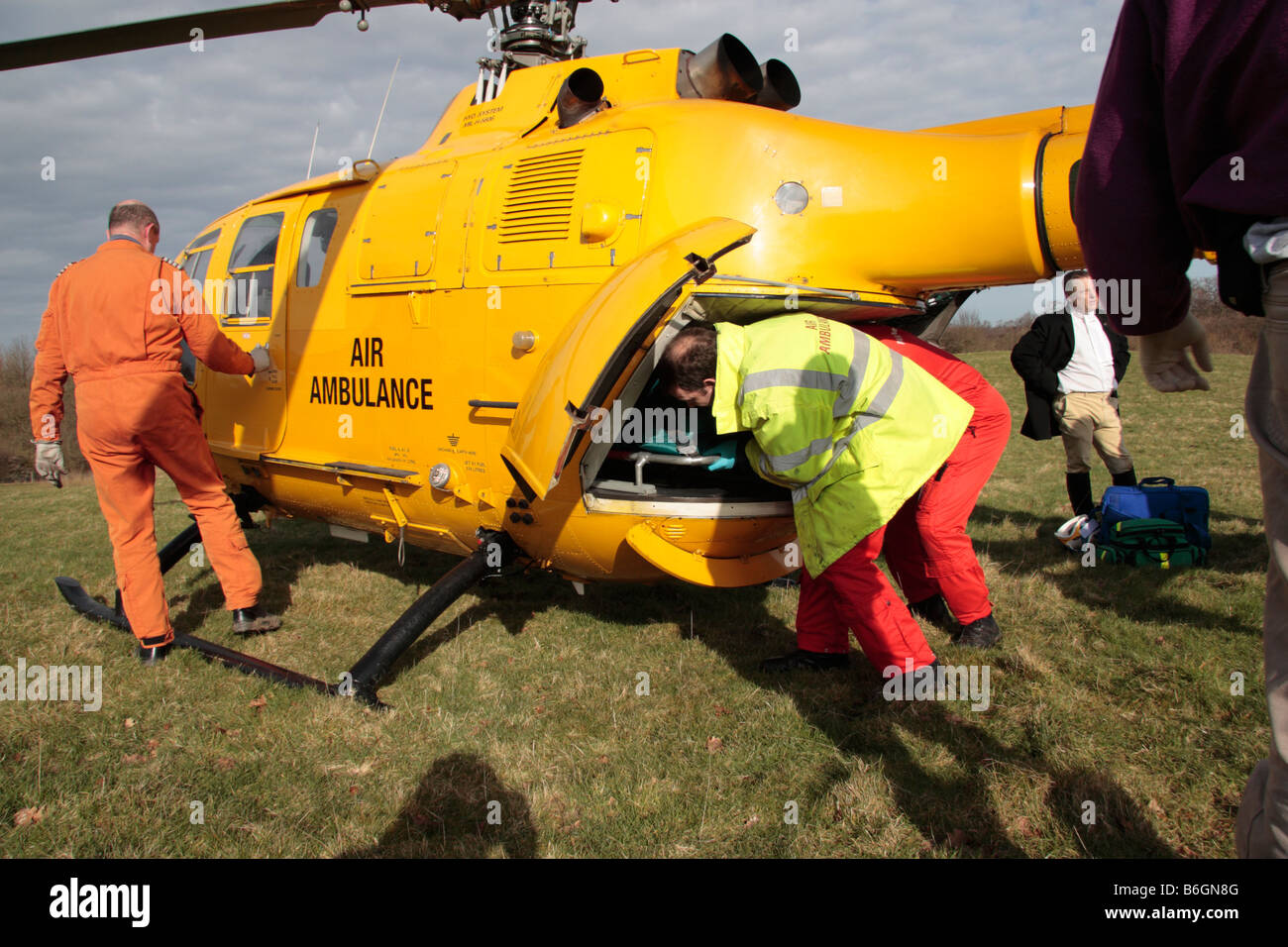 Loading an injured rider into the air ambulance at the Bedale and West Yorkshire hunt Stock ...