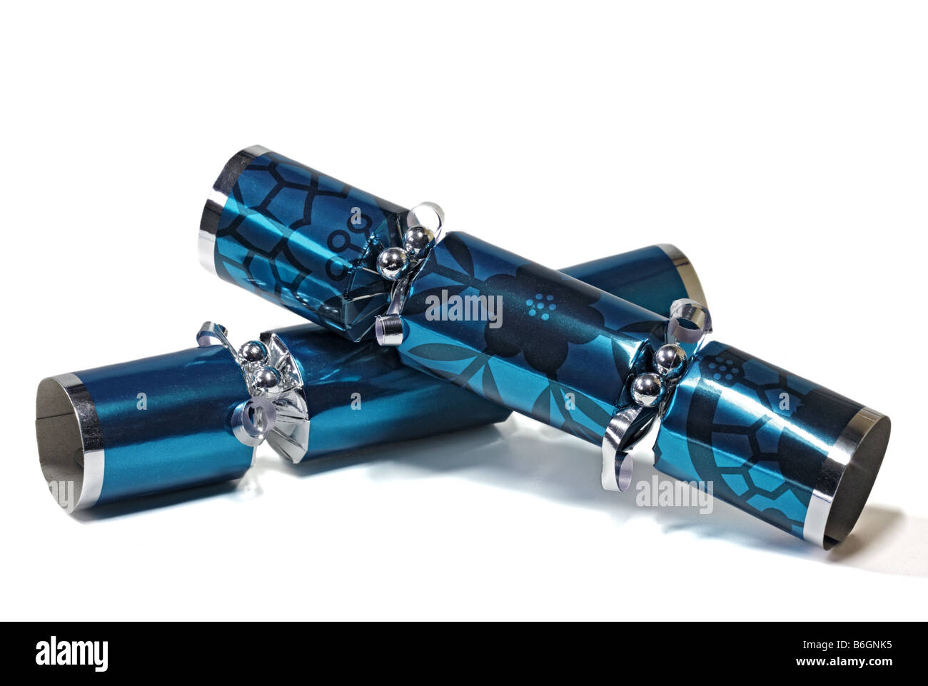Two Blue Christmas Crackers on white Stock Photo - Alamy
