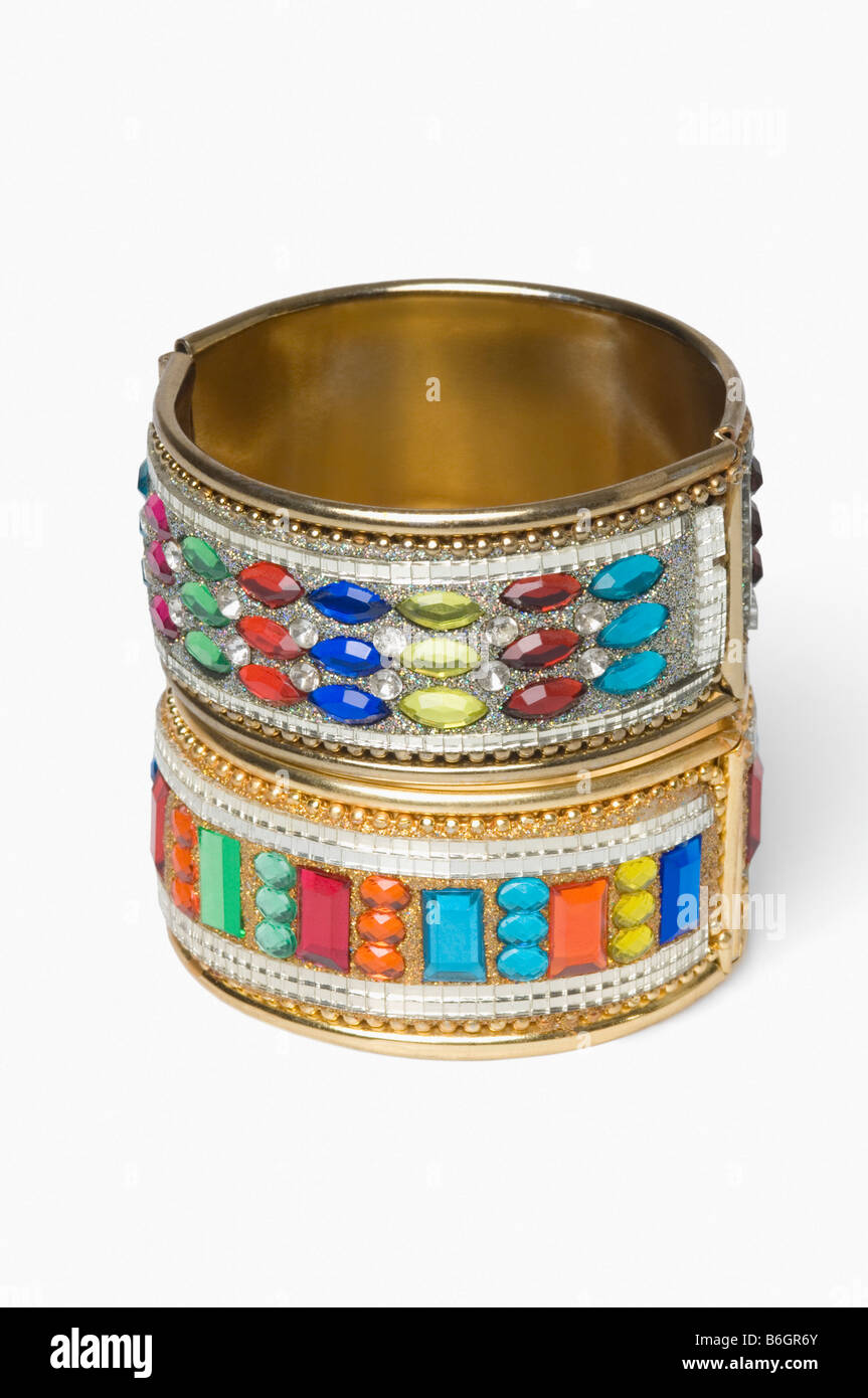 Gold bangles bracelets Cut Out Stock Images & Pictures - Alamy