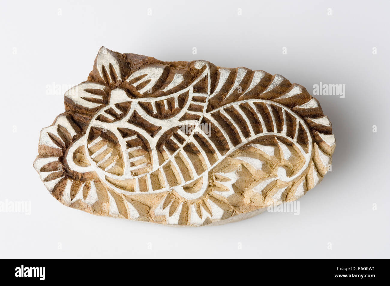 Flower engraved on wood Stock Photo - Alamy