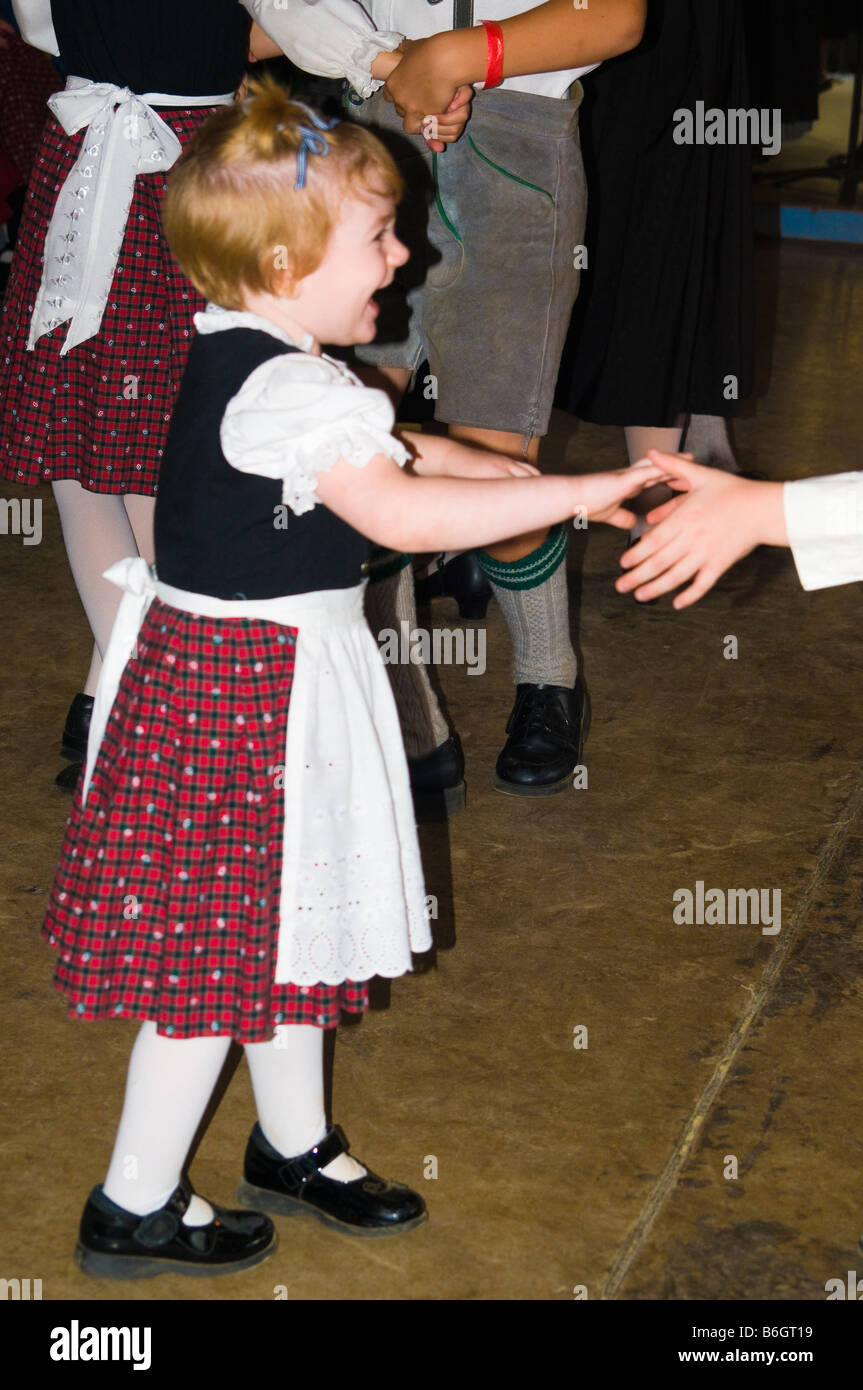 Young girl dancing at German Octoberfest celebration Stock Photo - Alamy