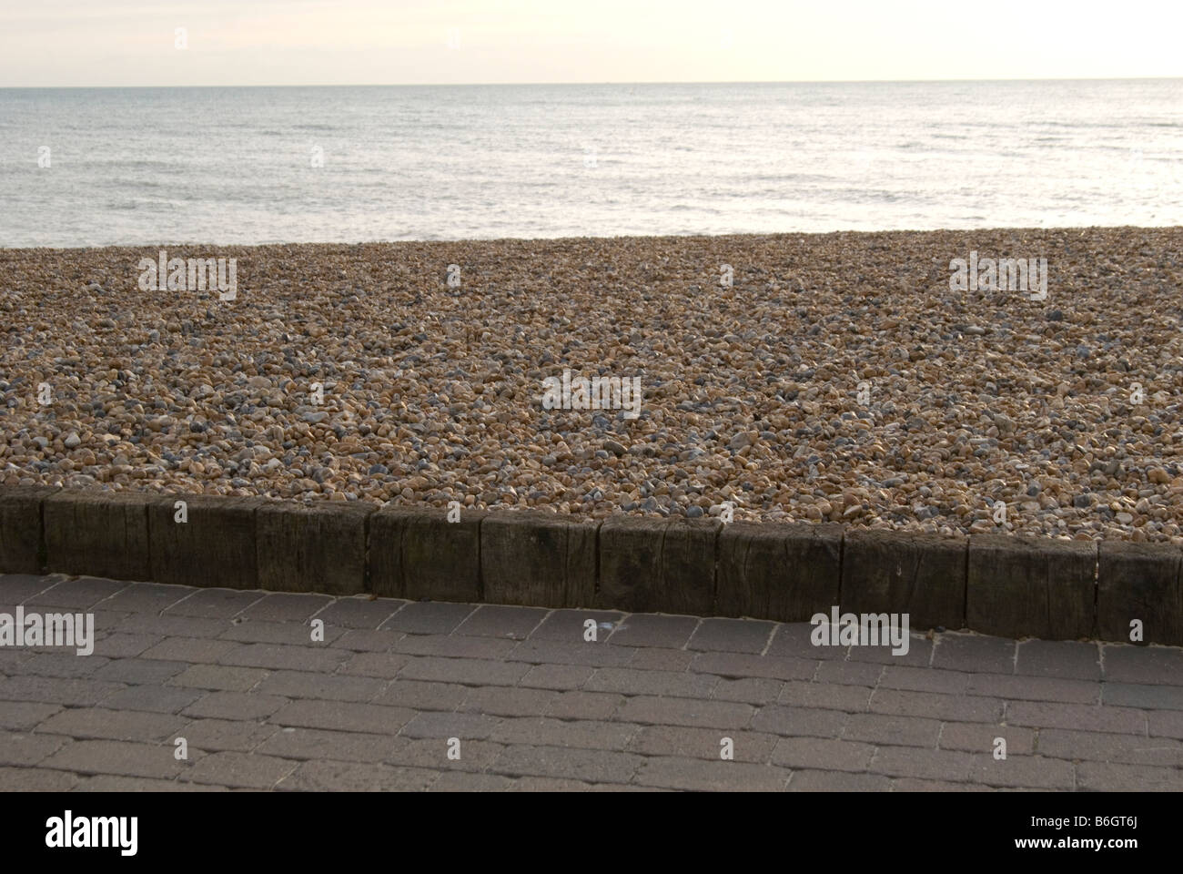 An image of Brighton beach on a sunny evening, the pebbles, ocean and ...