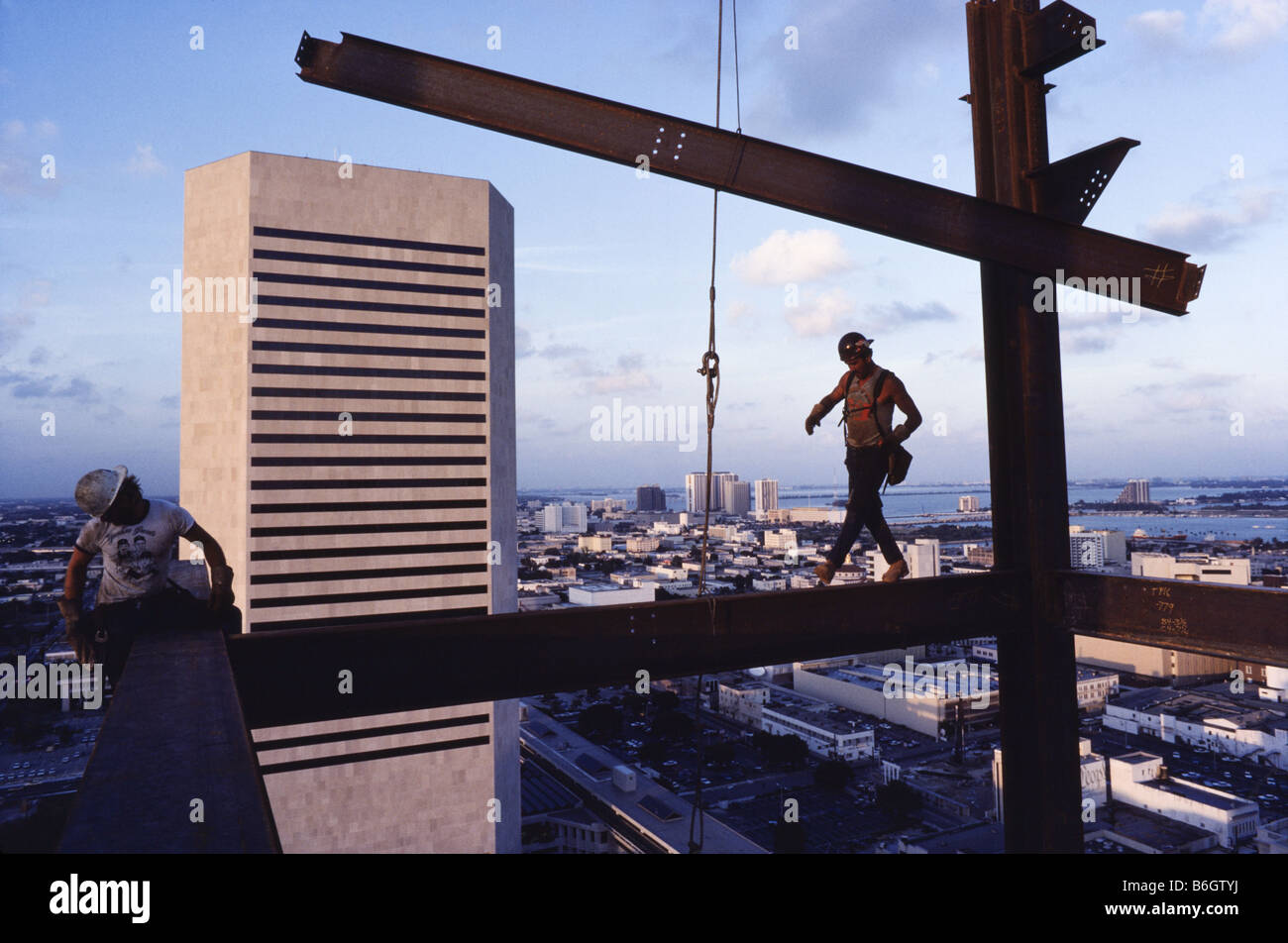 High Rise Building under construction, steel workers, walking on steel ...