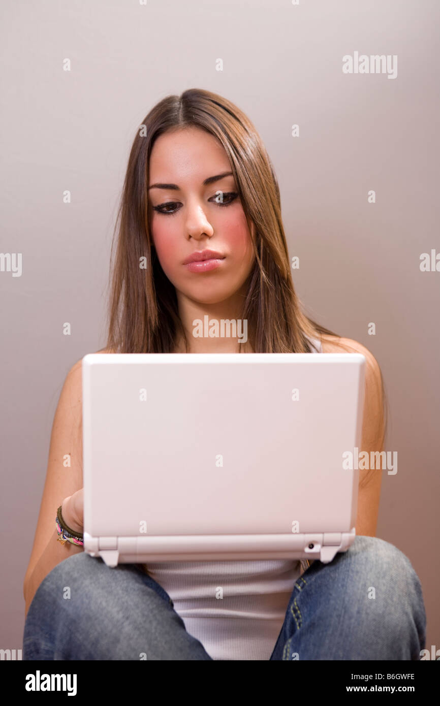 Woman with laptop Stock Photo - Alamy