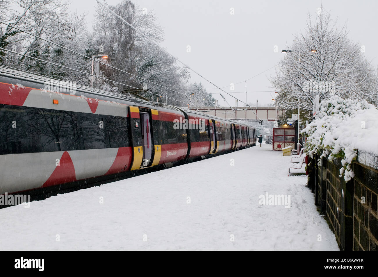 A morning train arrives at the railway station after an overnight ...